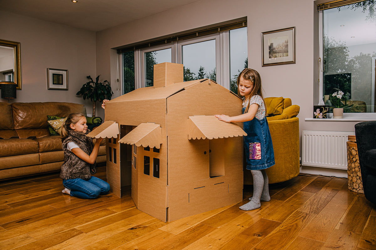 Cardboard Living Room Moving Day And Relocation Concept Stack Of